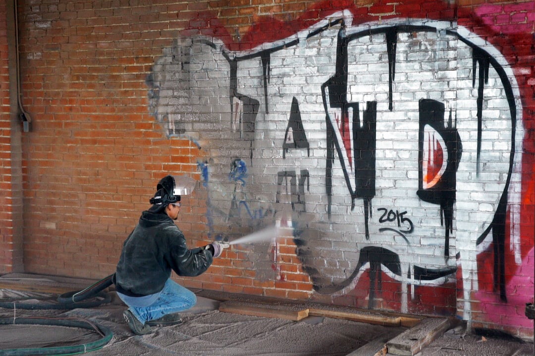 Dustless Blasting for Graffiti Removal